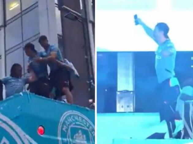 Jack Grealish nearly falls off Man City bus twice as players enjoy ...