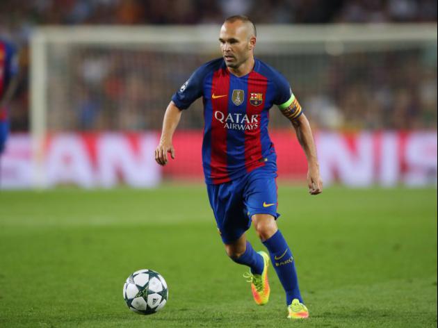 Barcelona midfielder Andres Iniesta signs lifetime contract